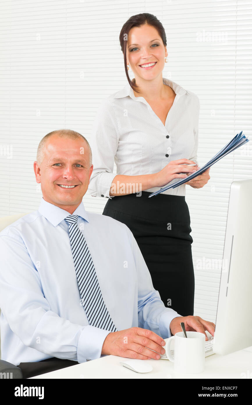 Professional senior businessman woman assistant Stock Photo - Alamy