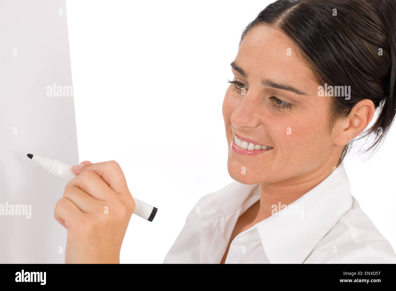 Happy businesswoman writing at empty flip chart Stock Photo - Alamy Happy businesswoman writing at empty flip chart Stock Photo - Alamy