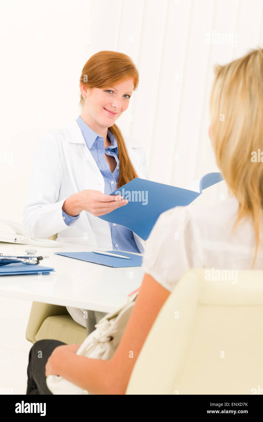 Female doctor consultation with patient in office Stock Photo - Alamy