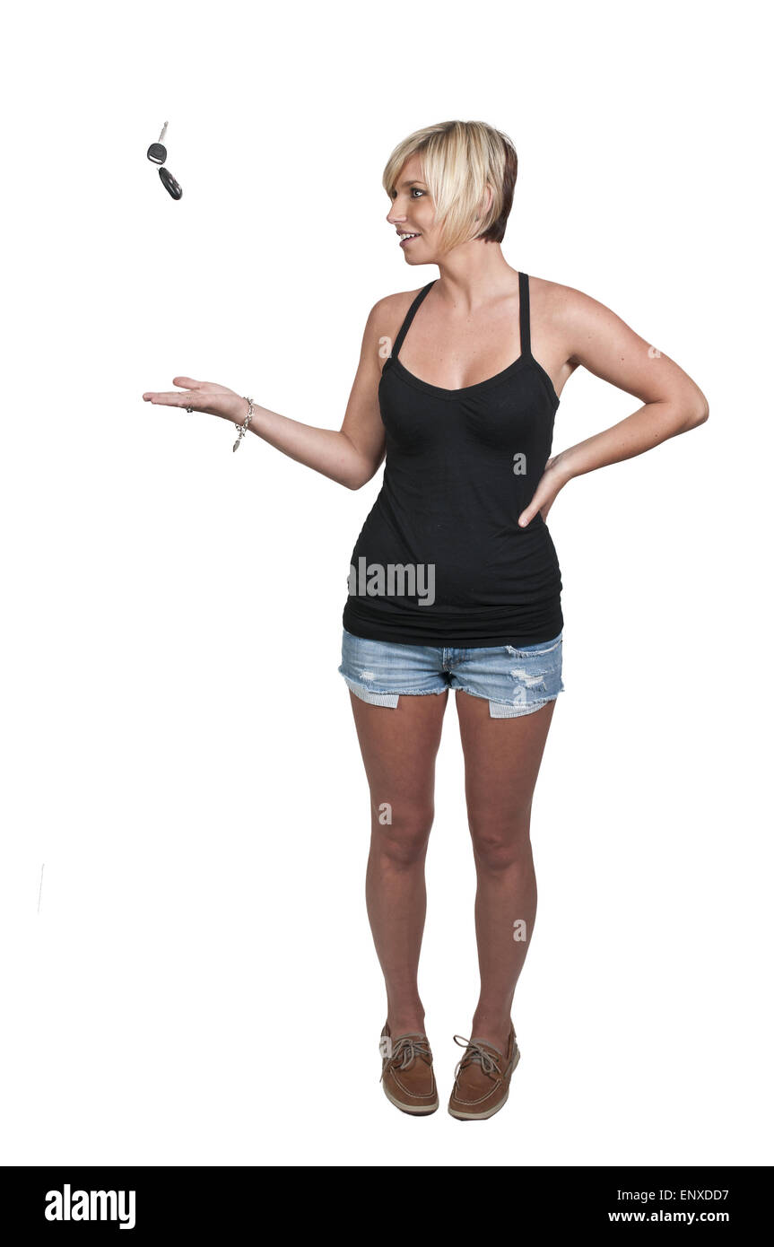 Female throwing keys hi-res stock photography and images - Alamy