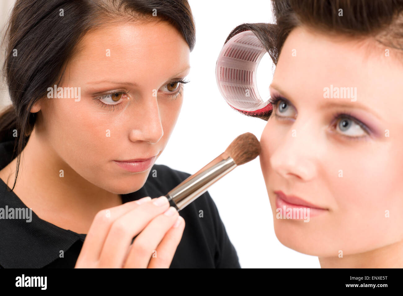 Make-up artist woman fashion model apply powder Stock Photo - Alamy