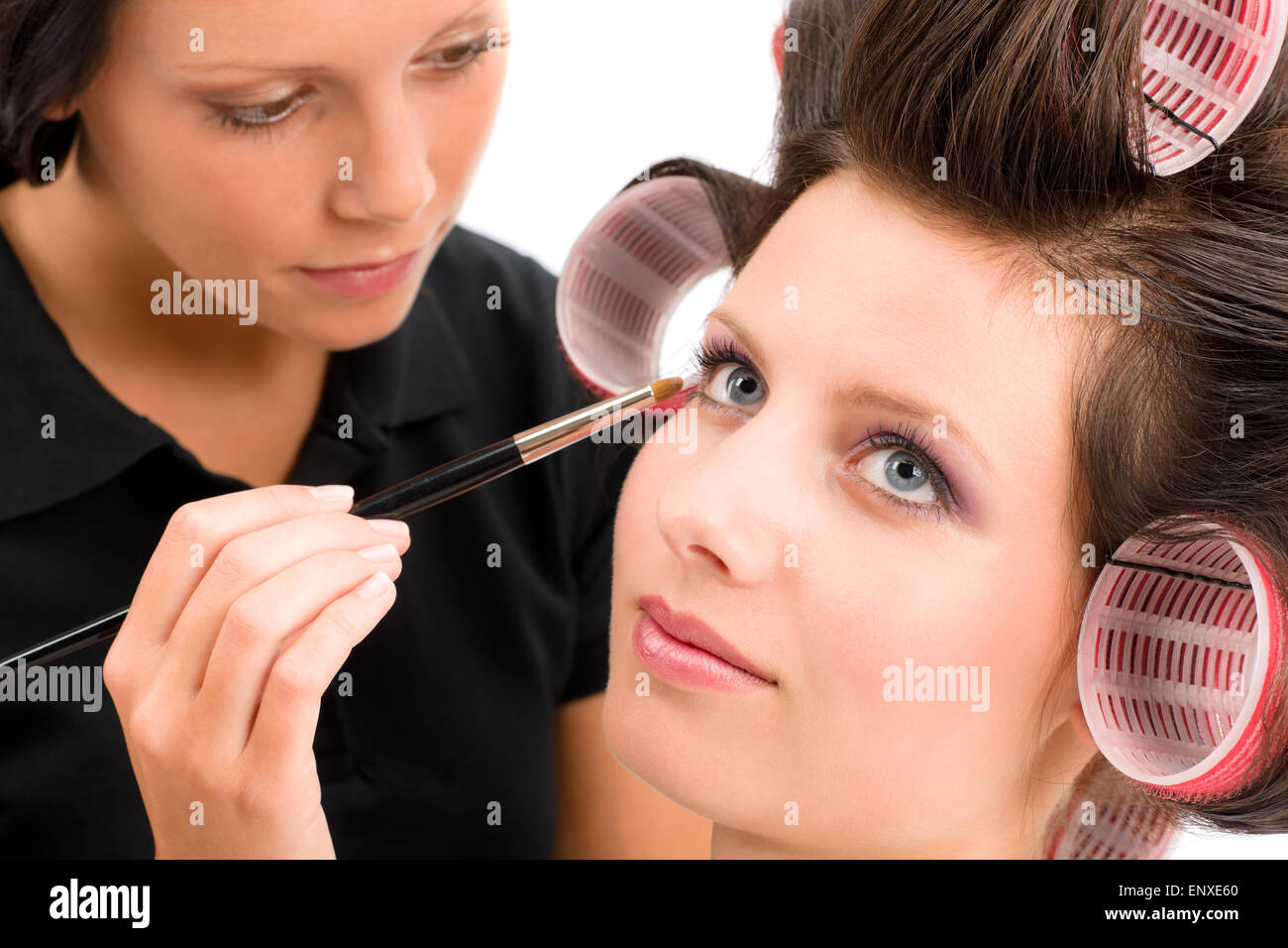 Make-up artist woman fashion model apply eyeshadow Stock Photo - Alamy