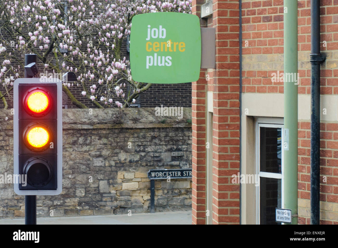 Job center Plus Sign with Traffic Light in front of it Stock Photo - Alamy