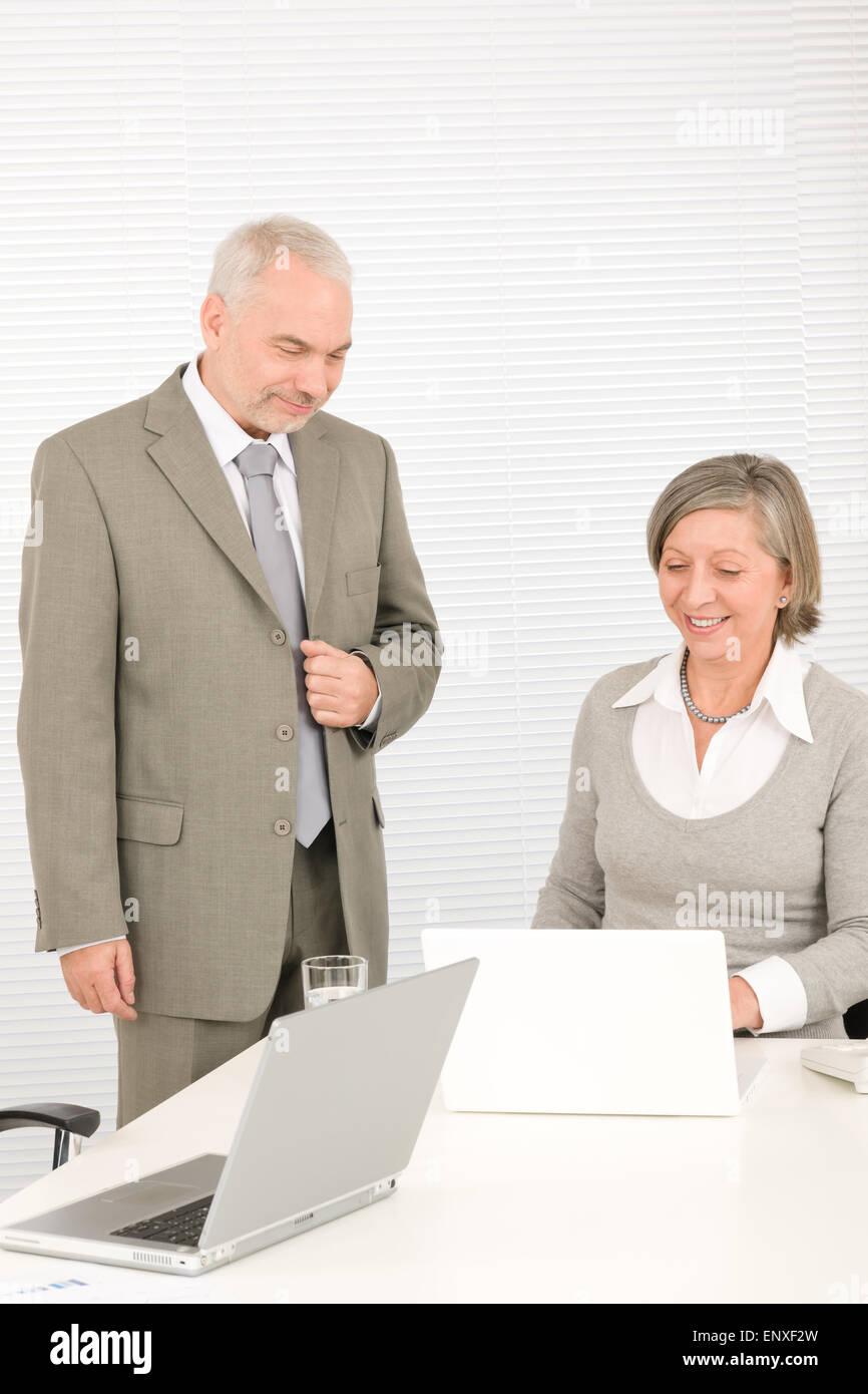 Senior business executive working in hi-res stock photography and ...