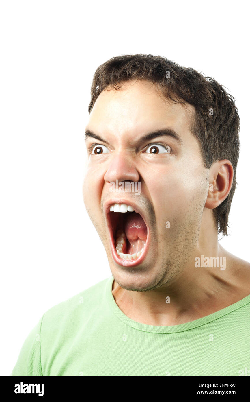 portrait of young angry man sreaming isolated Stock Photo - Alamy