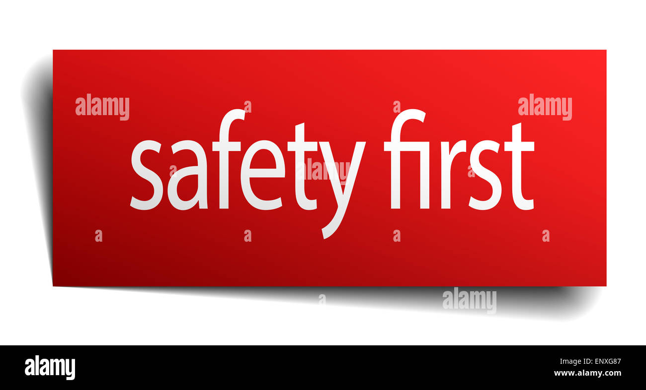 safety first red paper sign isolated on white Stock Photo - Alamy