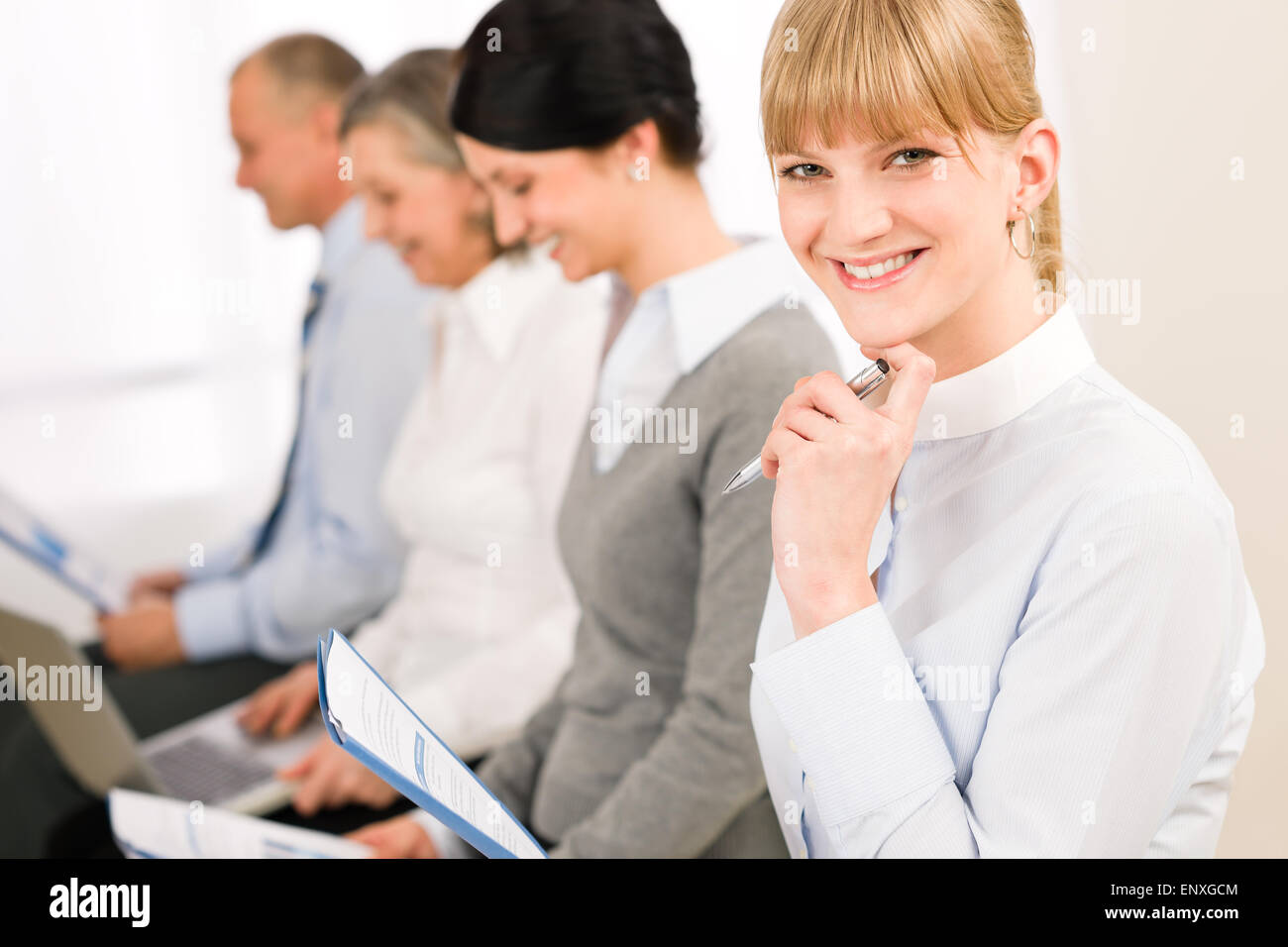 Interview business people waiting study report Stock Photo - Alamy