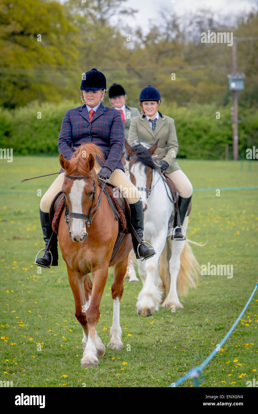Riders and their horses take part in a local Riding Club Show held at ...
