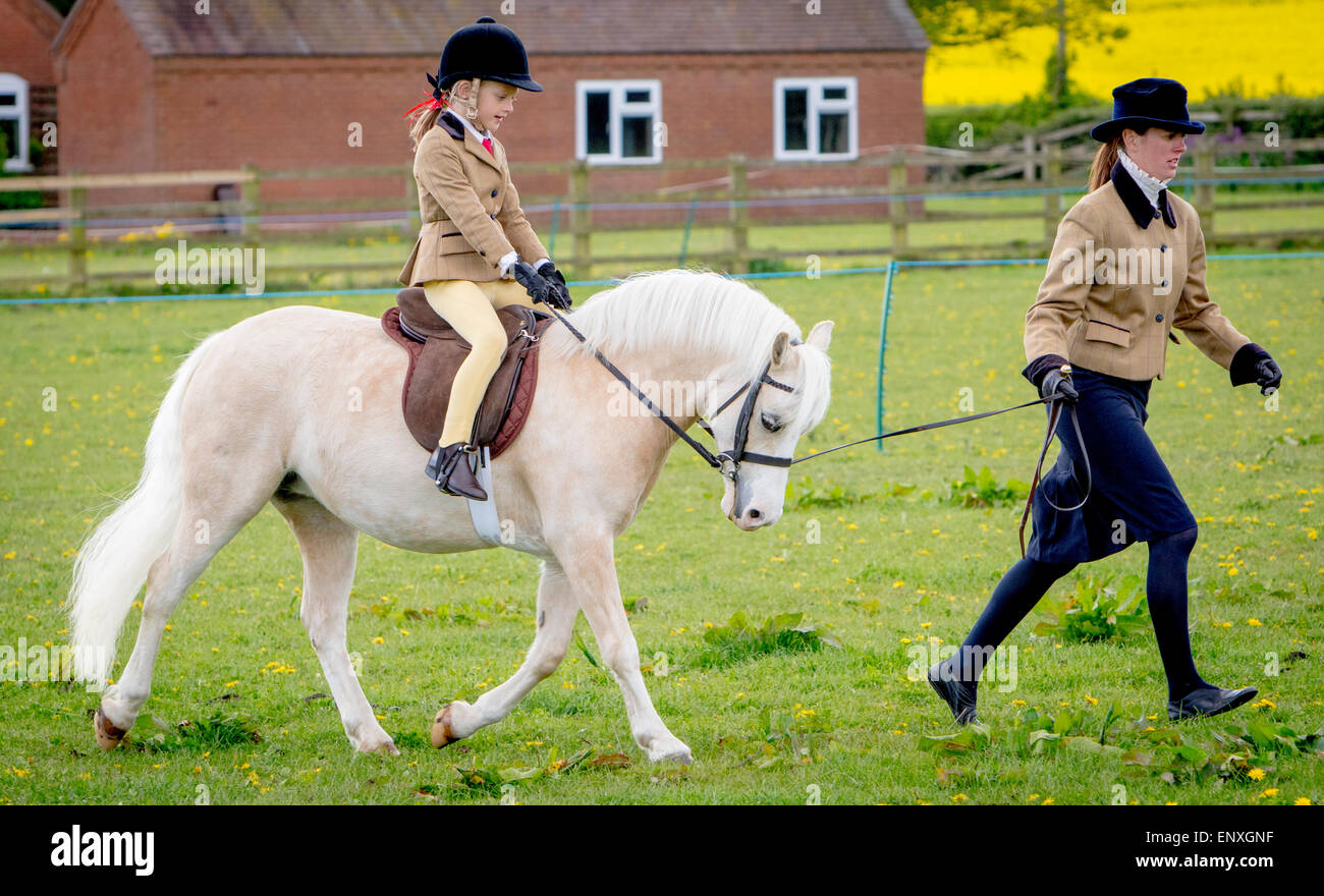 Riders and their horses take part in a local Riding Club Show held at ...