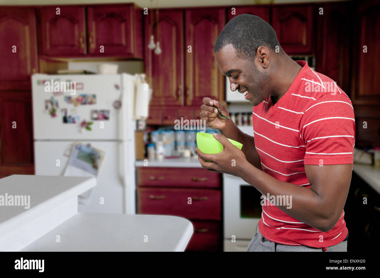 Black Man Eating Stock Photo - Alamy