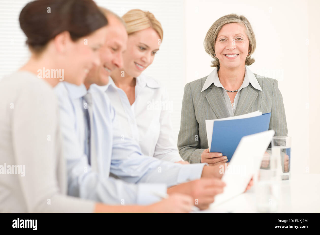 Business team pretty businesswomen with colleagues Stock Photo - Alamy