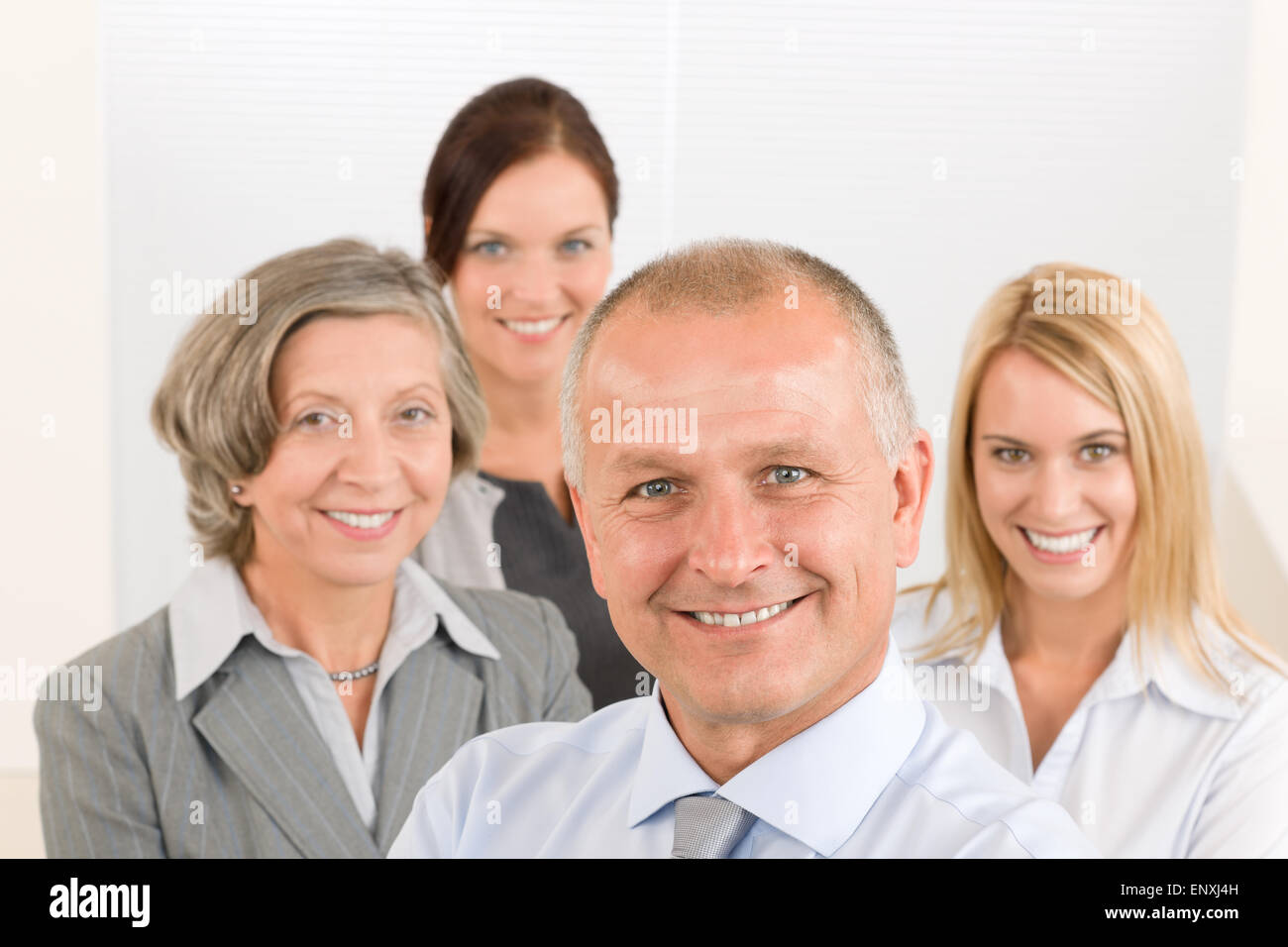 Business team senior manager with happy colleagues Stock Photo - Alamy