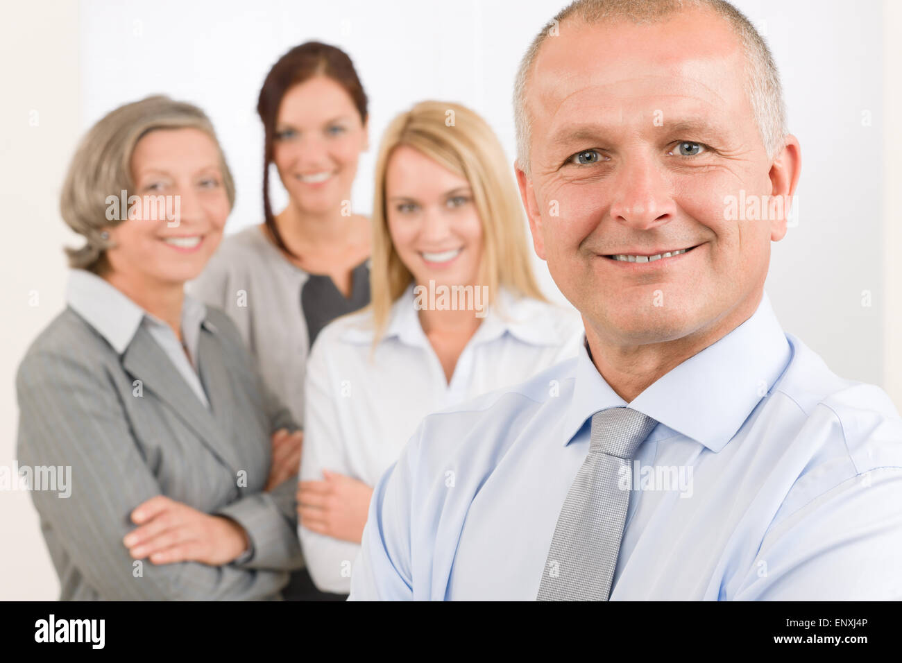 Business team senior manager with happy colleagues Stock Photo - Alamy