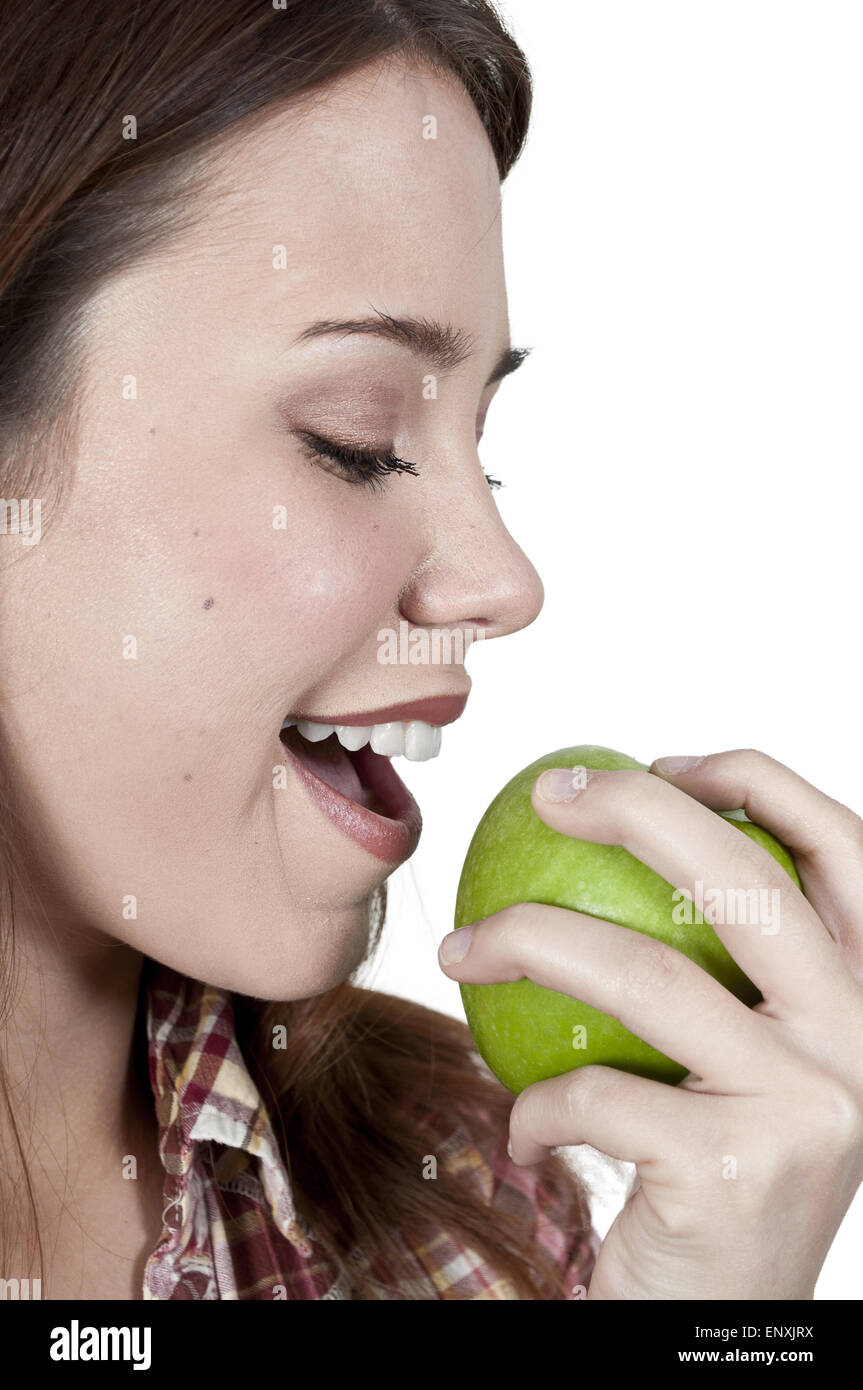 Woman Eating an Apple Stock Photo - Alamy