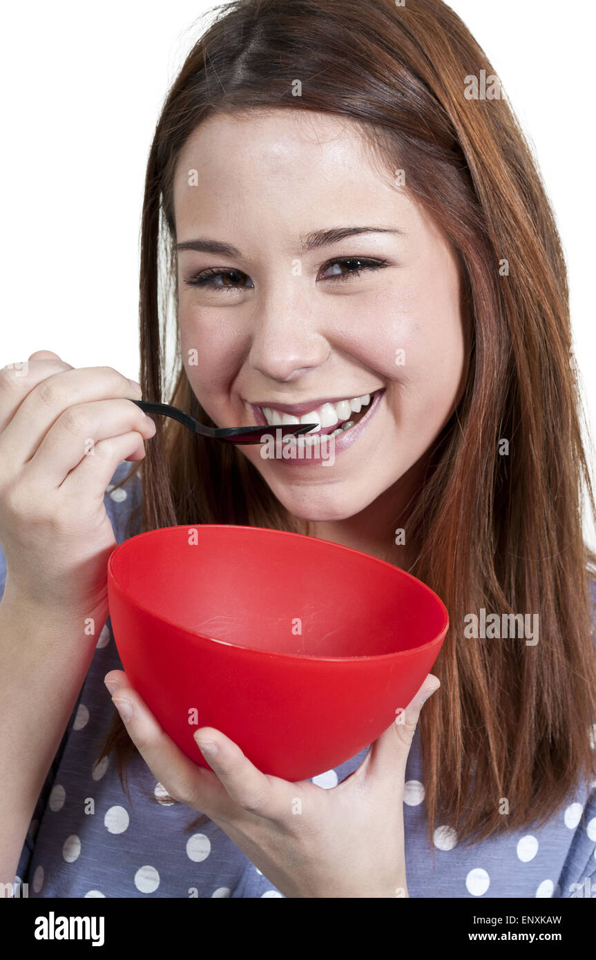 Woman eating all bran breakfast cereal hi-res stock photography and ...