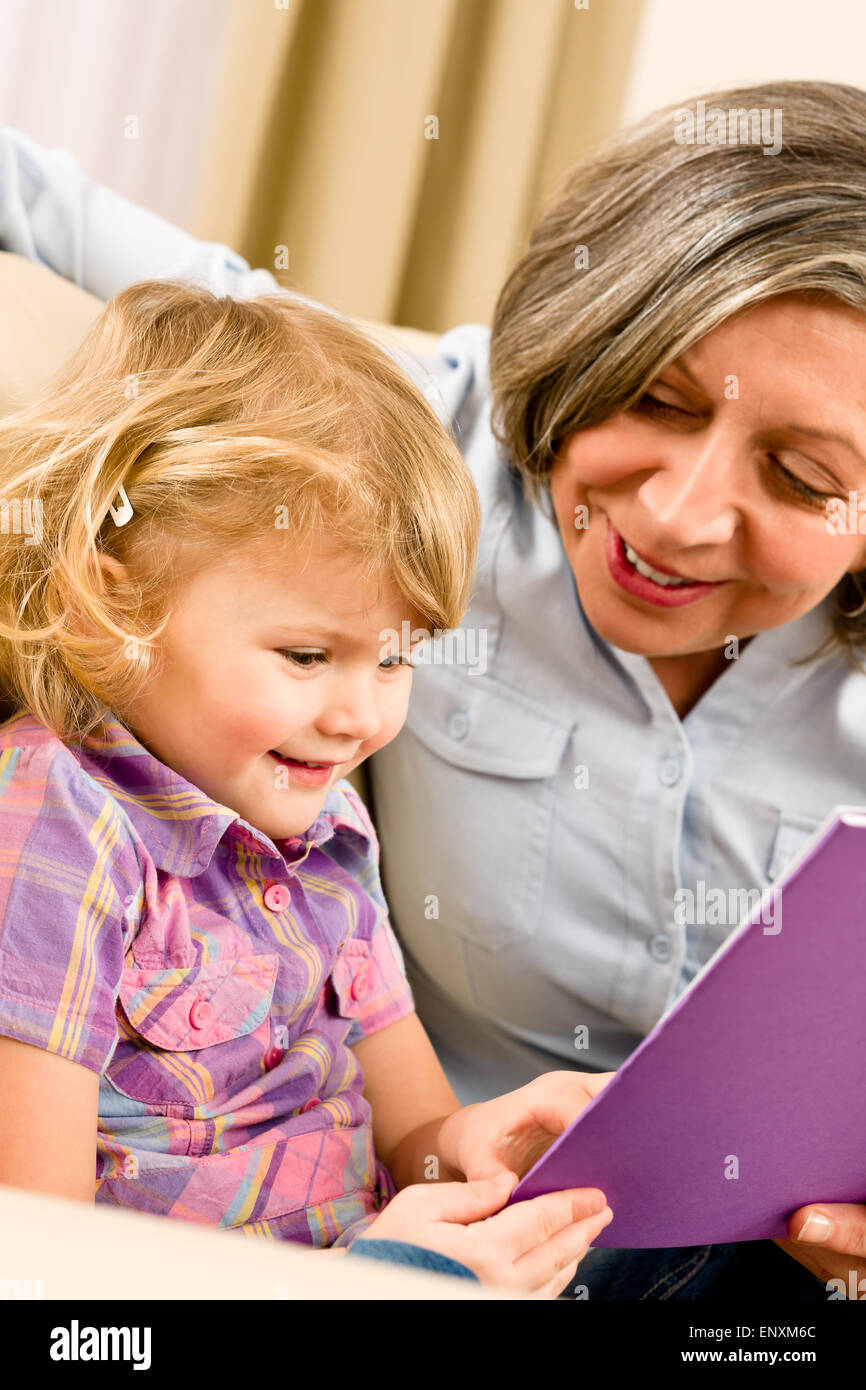 Grandparent read story hi-res stock photography and images - Alamy
