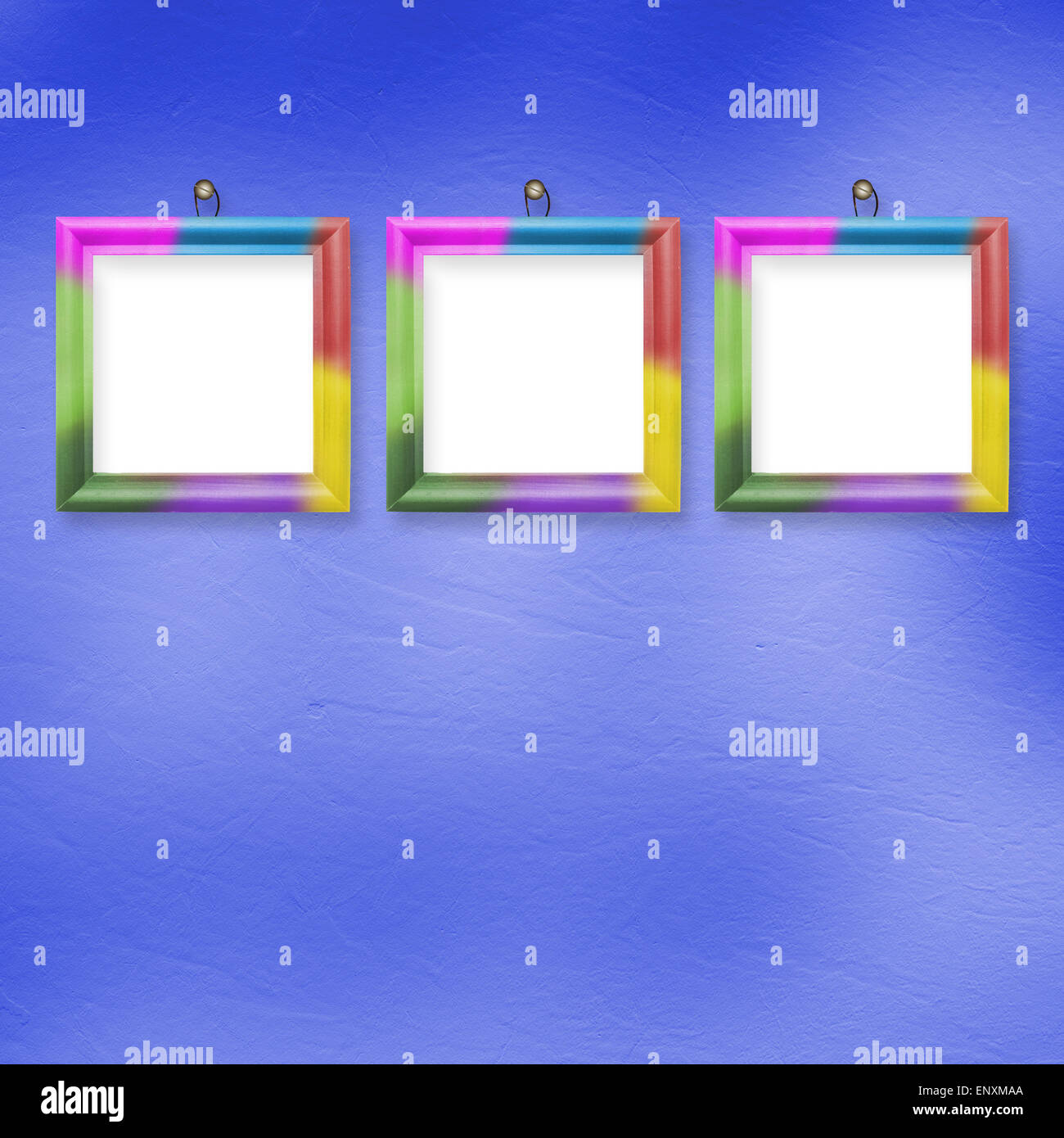Multicolored bright frames hanging on the abstract pastel background ...