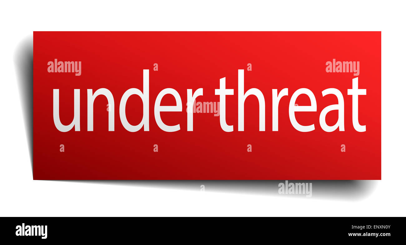 under threat red paper sign on white background Stock Photo - Alamy