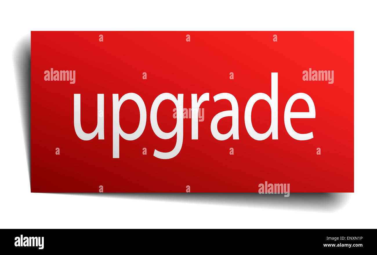 upgrade red paper sign on white background Stock Photo - Alamy