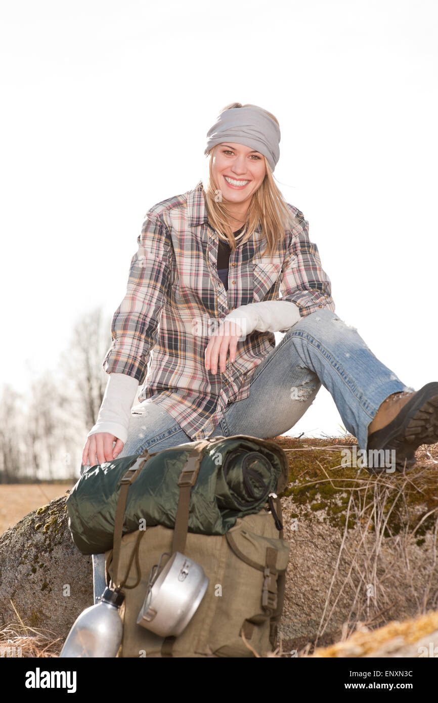 Camping young woman in countryside backpack relax Stock Photo - Alamy