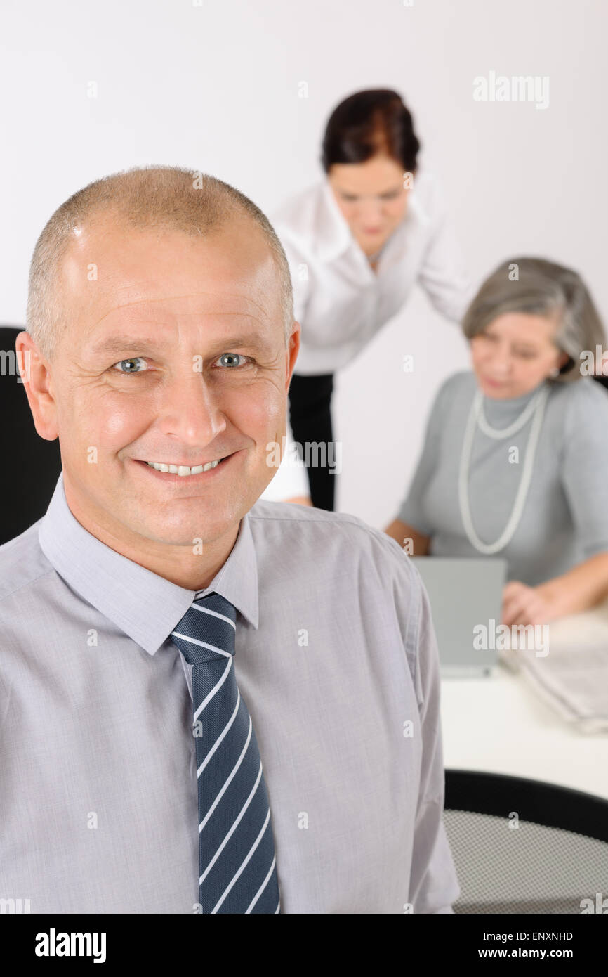 Business team senior manager with happy colleagues Stock Photo - Alamy