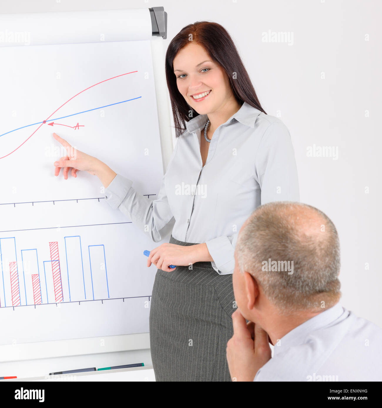 Giving presentation young woman during meeting Stock Photo - Alamy