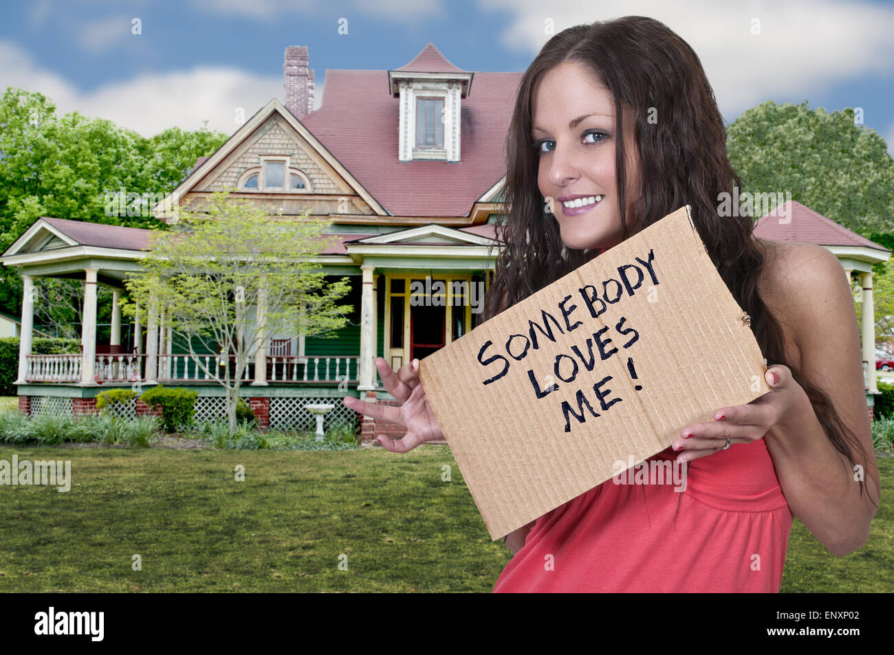 Woman Holding a Sign Stock Photo - Alamy