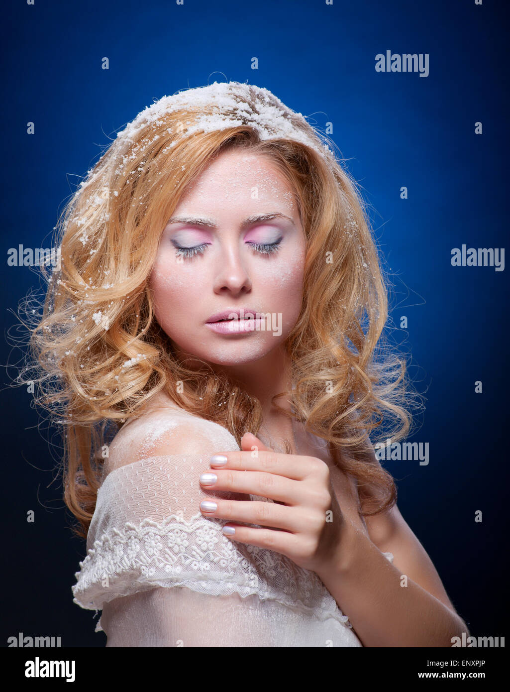 Young beautiful woman with snowy skin (warm colors Stock Photo - Alamy