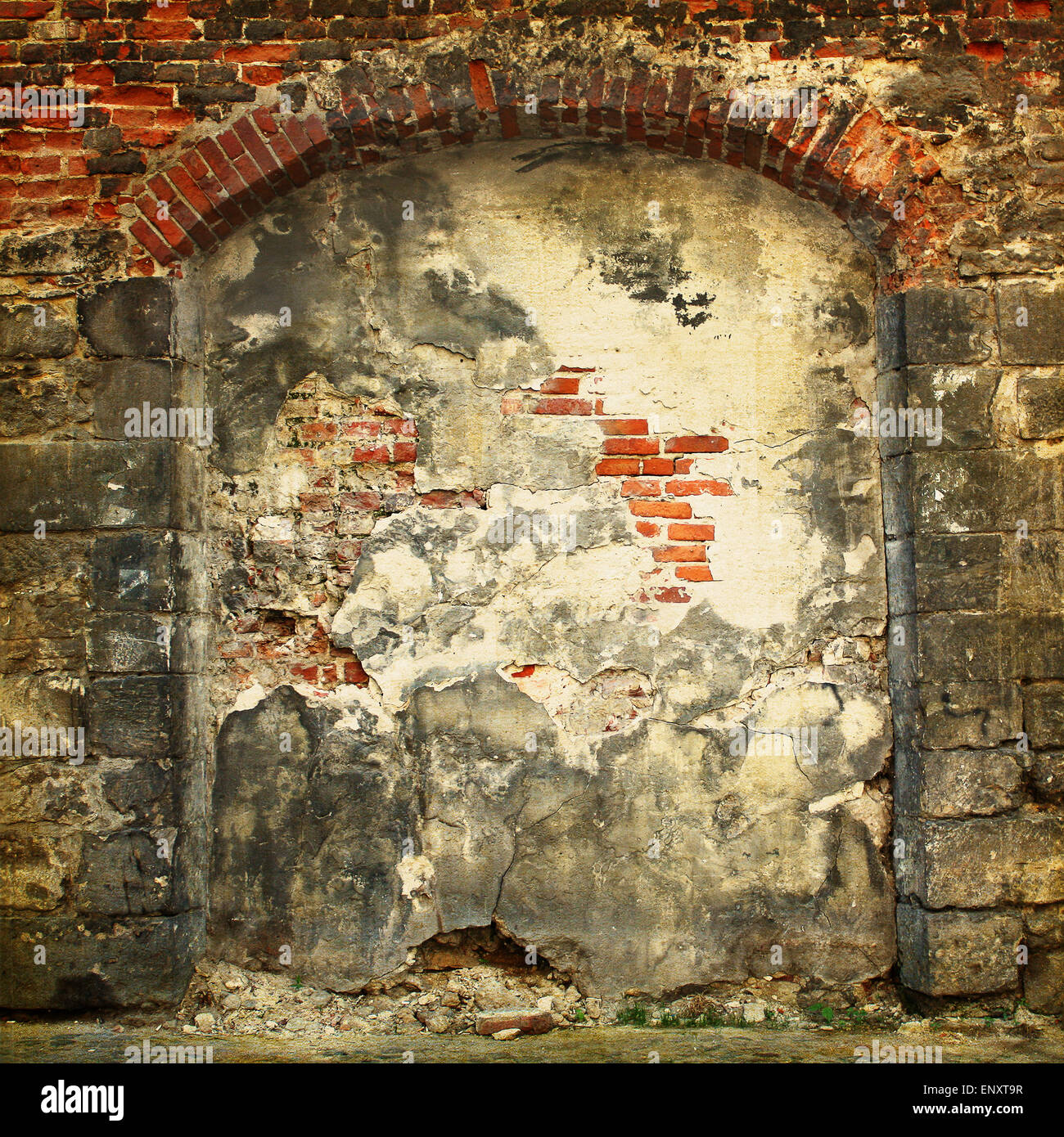 Collapsing stone wall of an old house with brick masonry Stock Photo ...