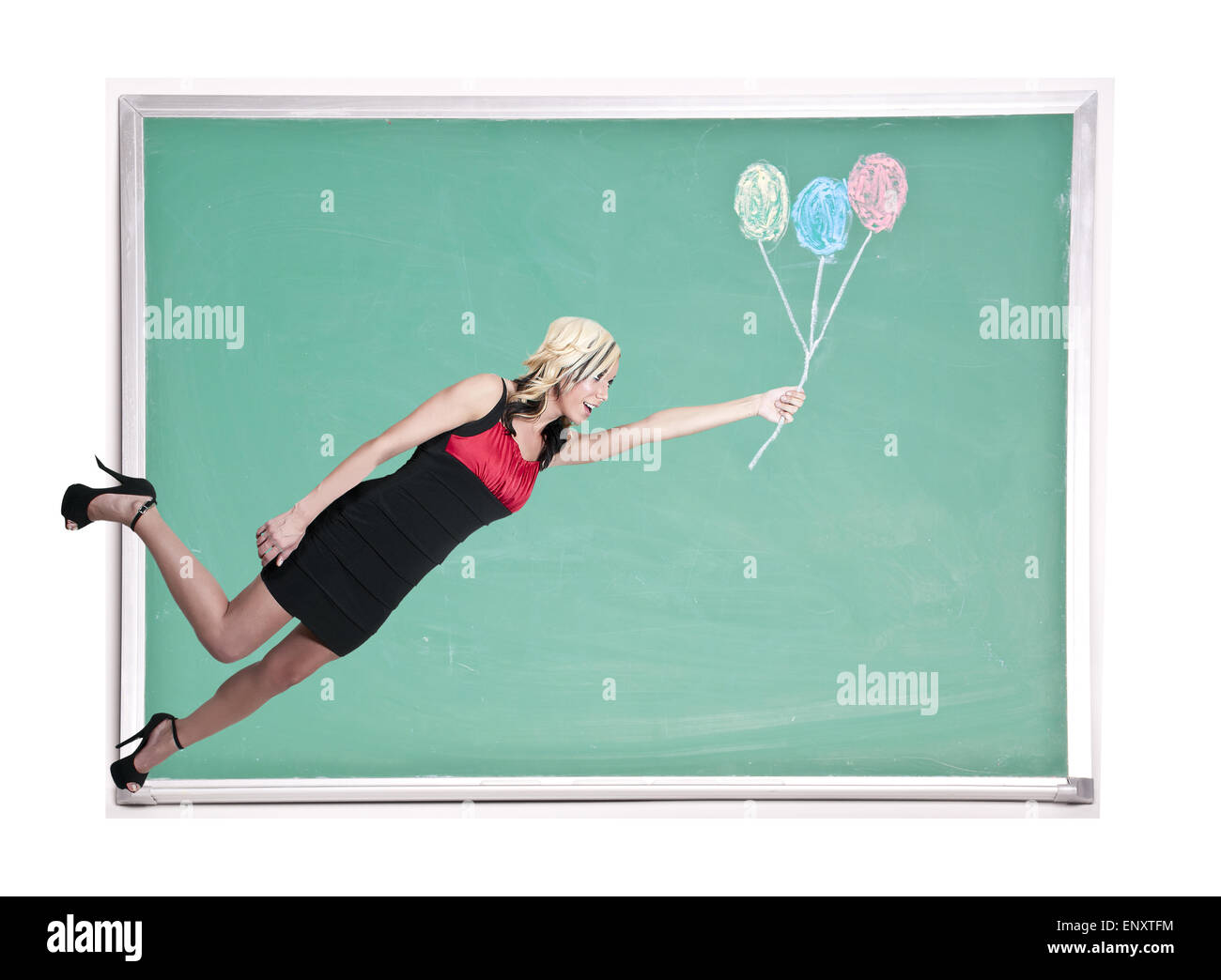 Woman Floating with Chalk Balloons Stock Photo - Alamy