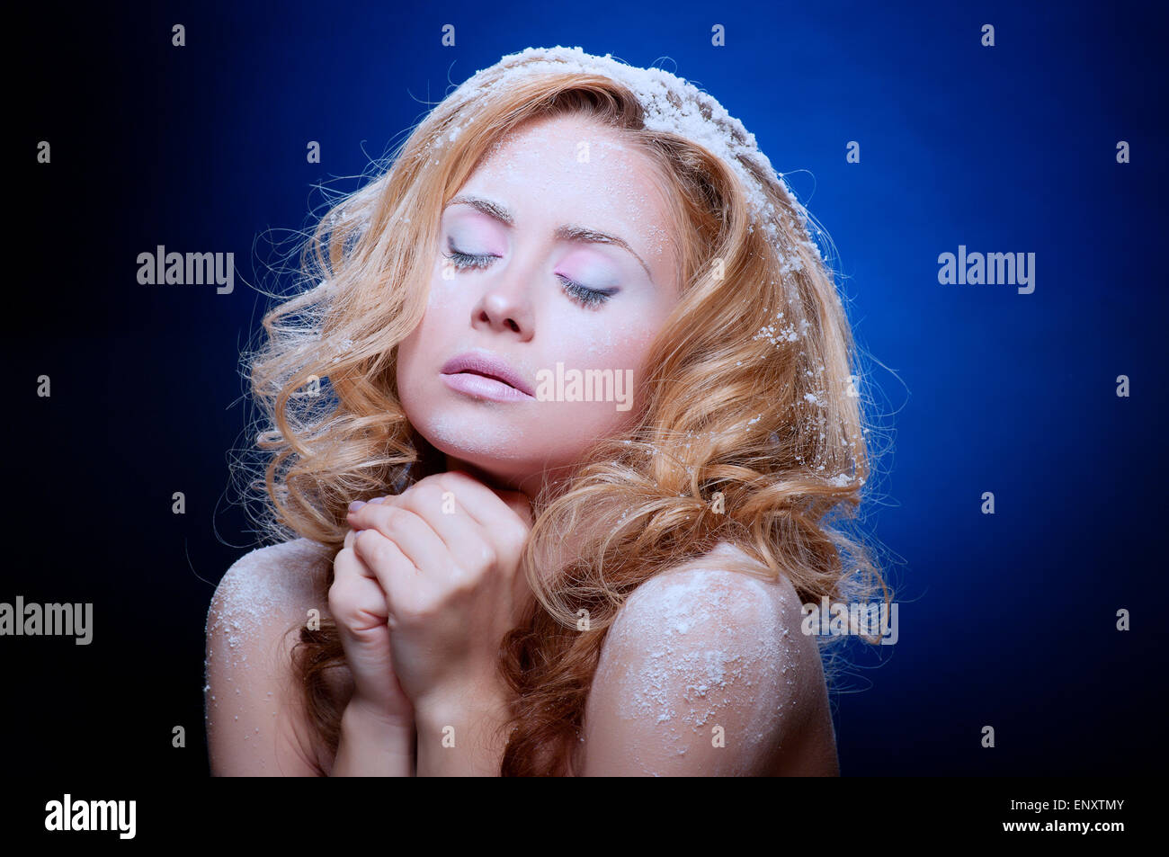 Young beautiful woman with snowy skin (cold colors Stock Photo - Alamy