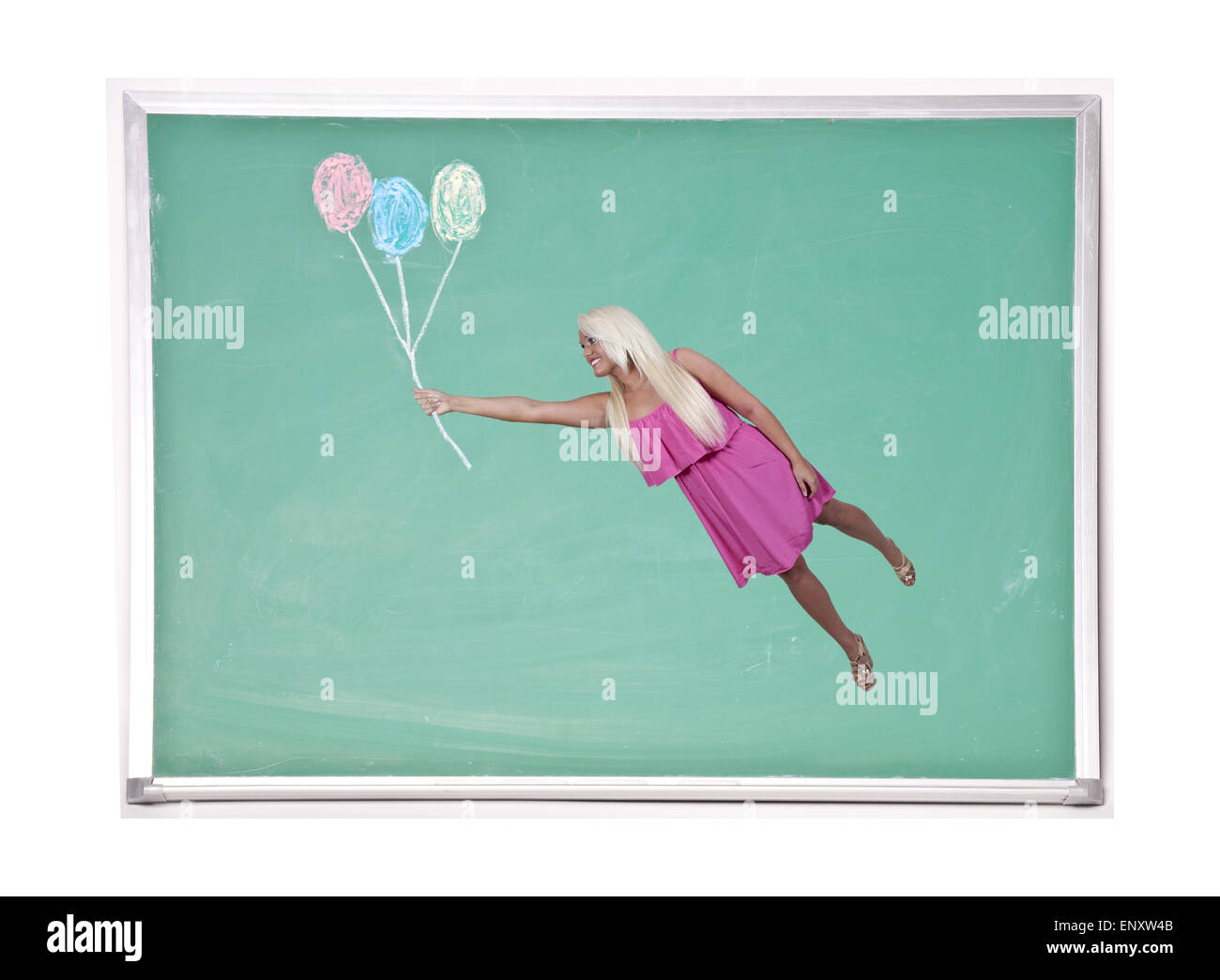 Woman Floating with Chalk Balloons Stock Photo - Alamy