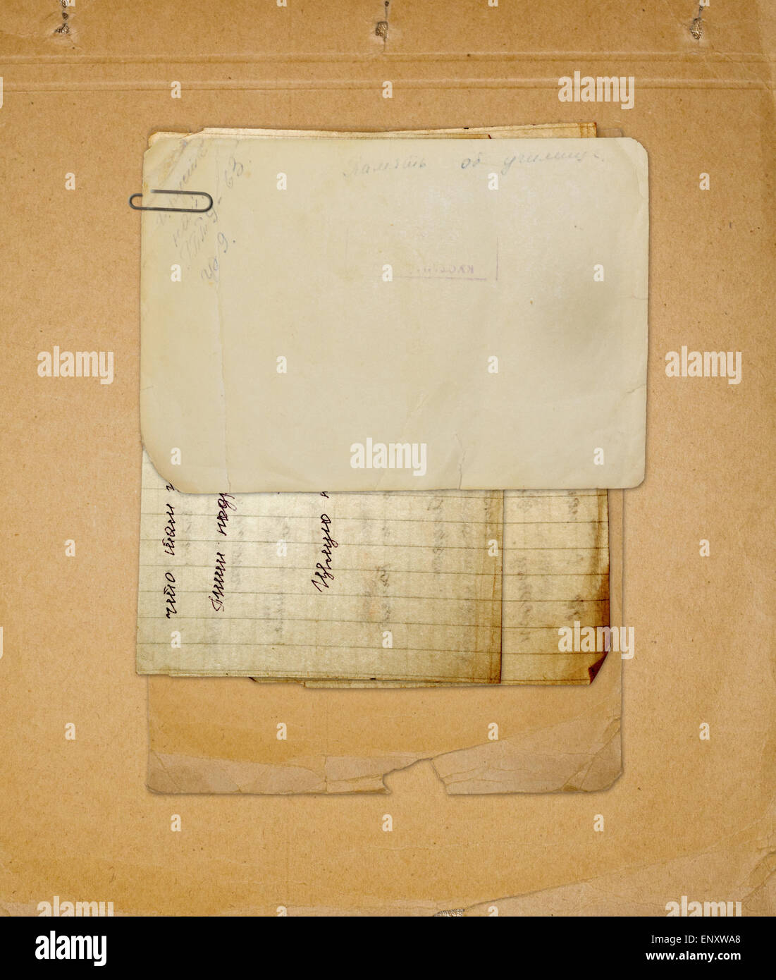 Old archive with letters, photos on the abstract grunge background ...