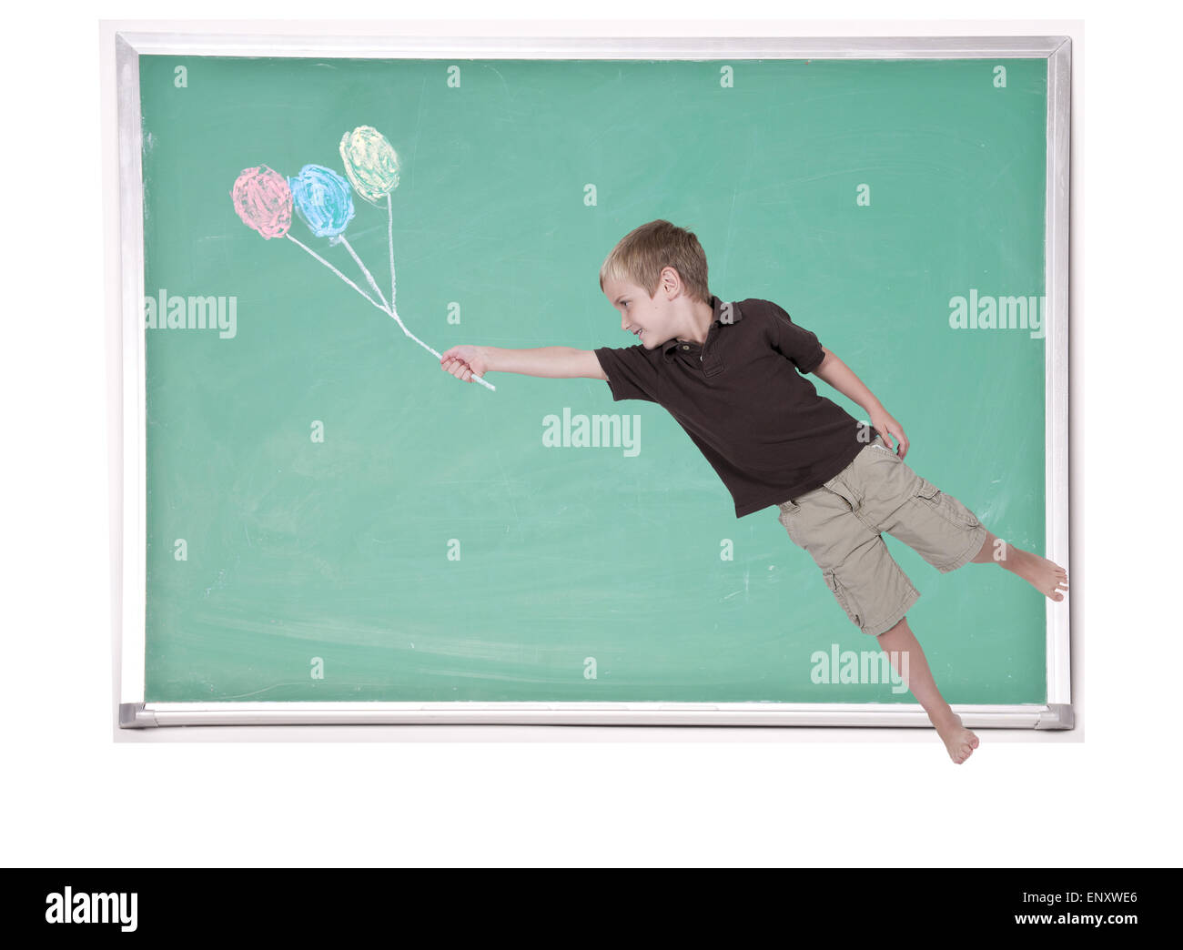 Boy Floating with Chalk Balloons Stock Photo - Alamy