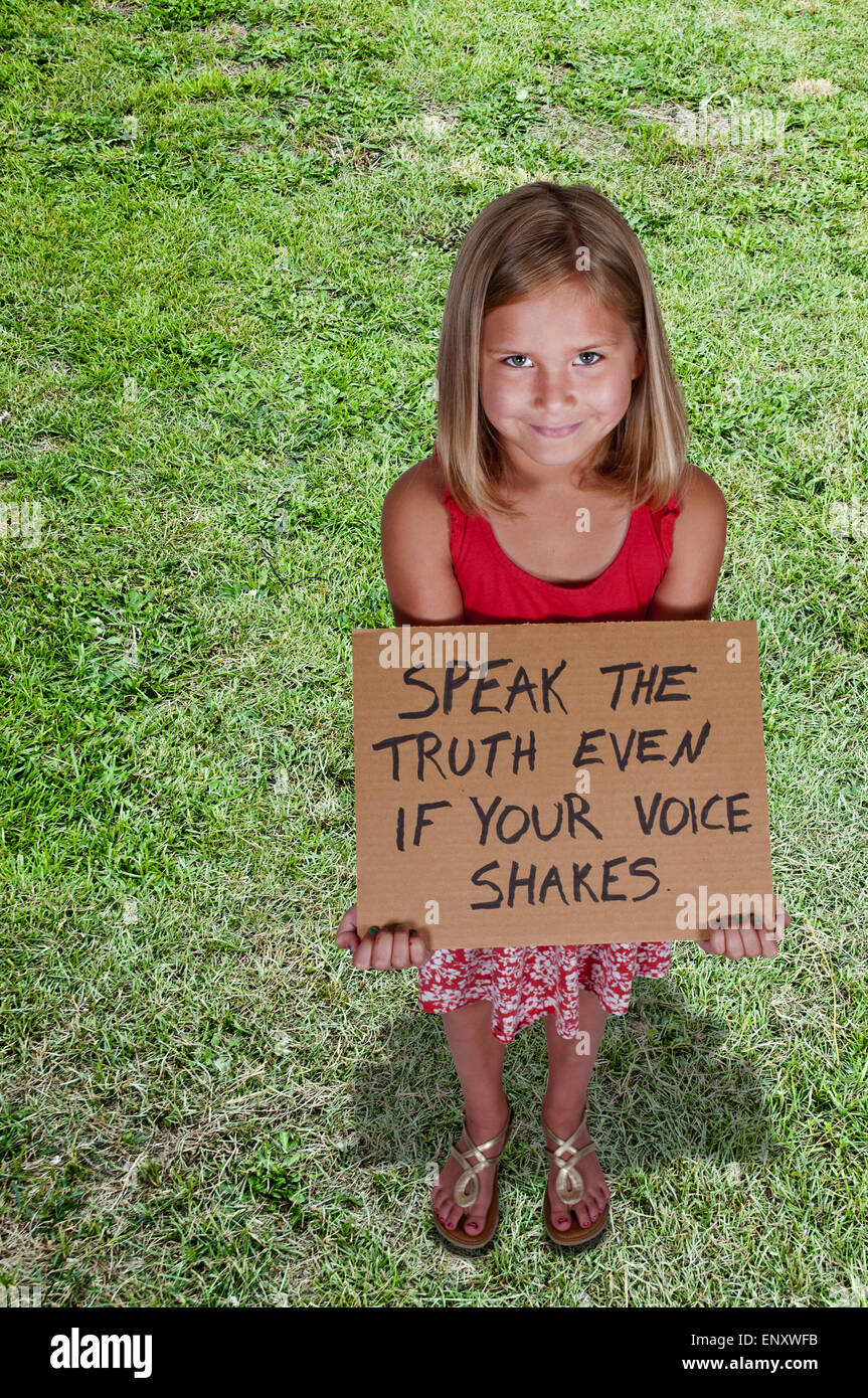 Little Girl Holding a Sign Stock Photo - Alamy