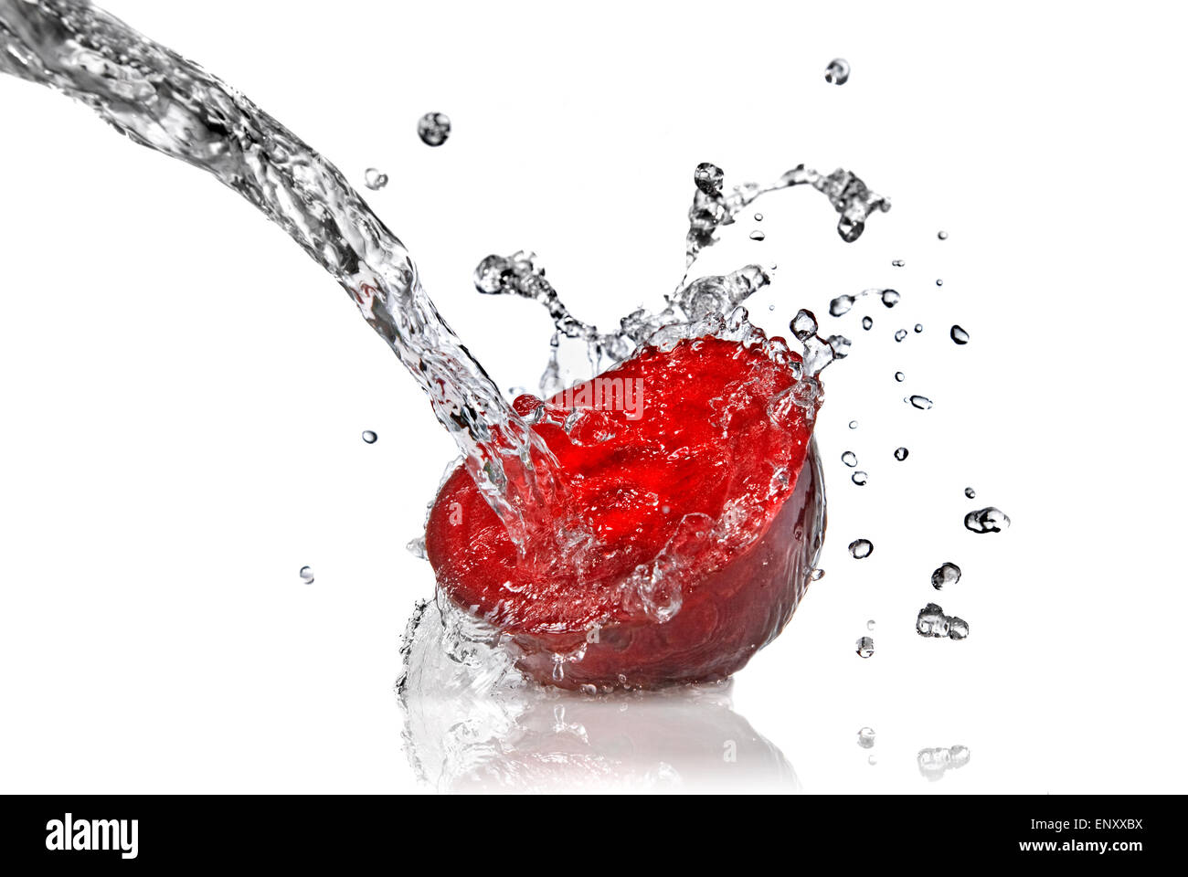 red beet with water splash isolated on white Stock Photo - Alamy