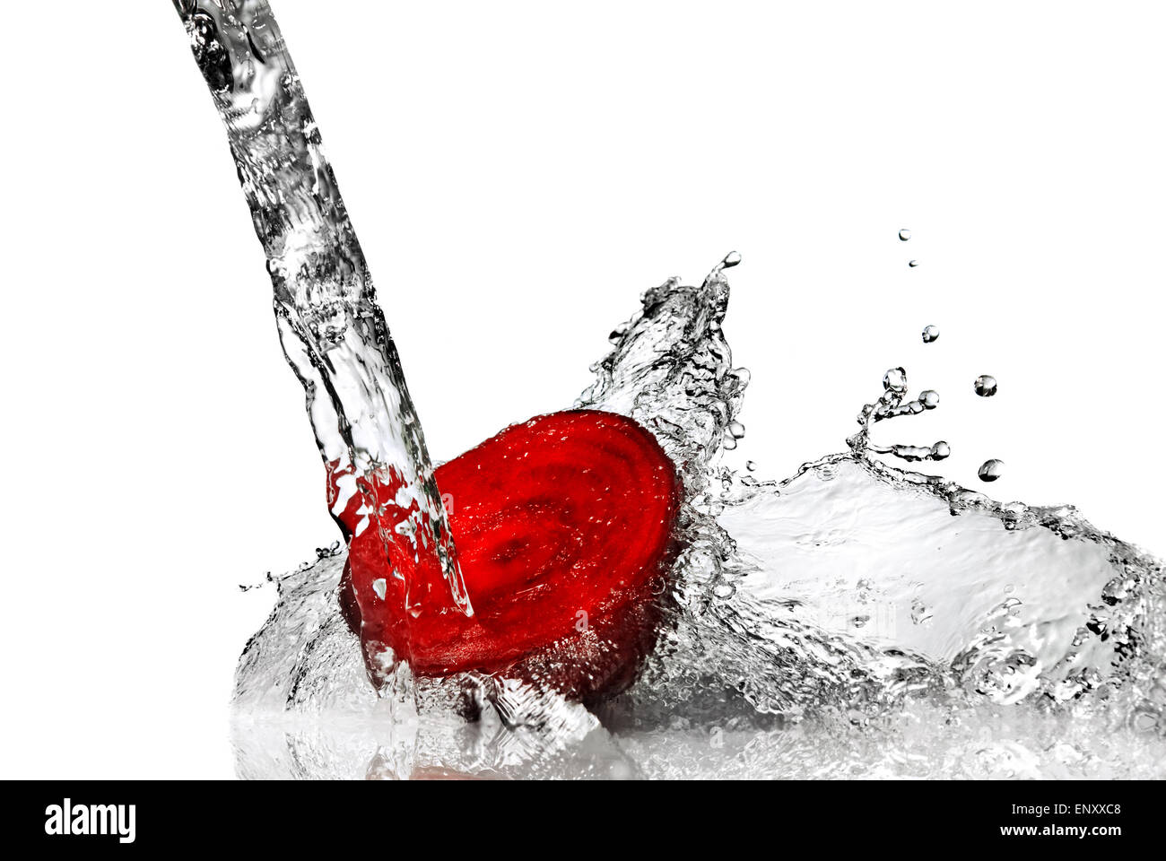red beet with water splash isolated on white Stock Photo - Alamy