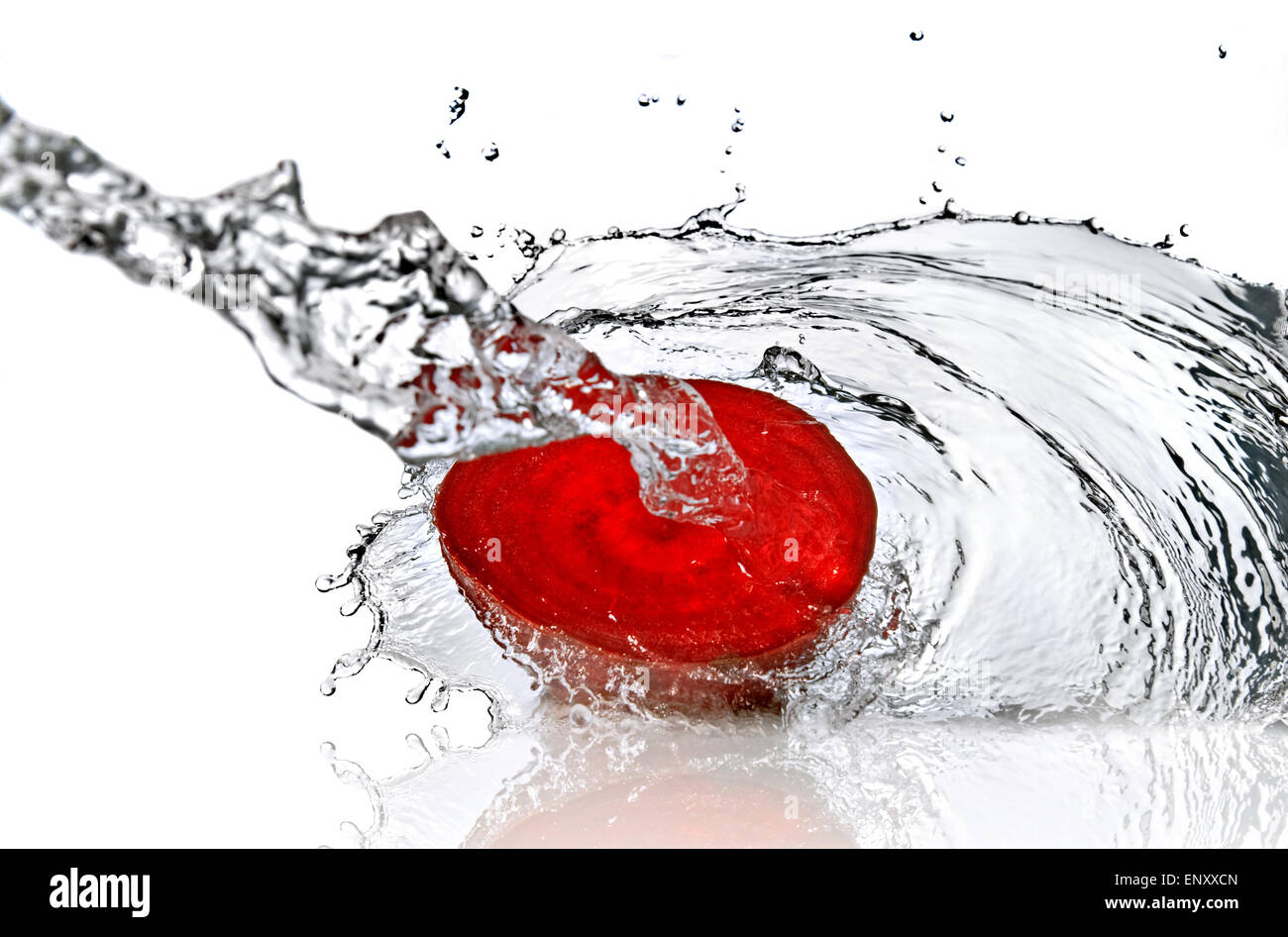 red beet with water splash isolated on white Stock Photo - Alamy