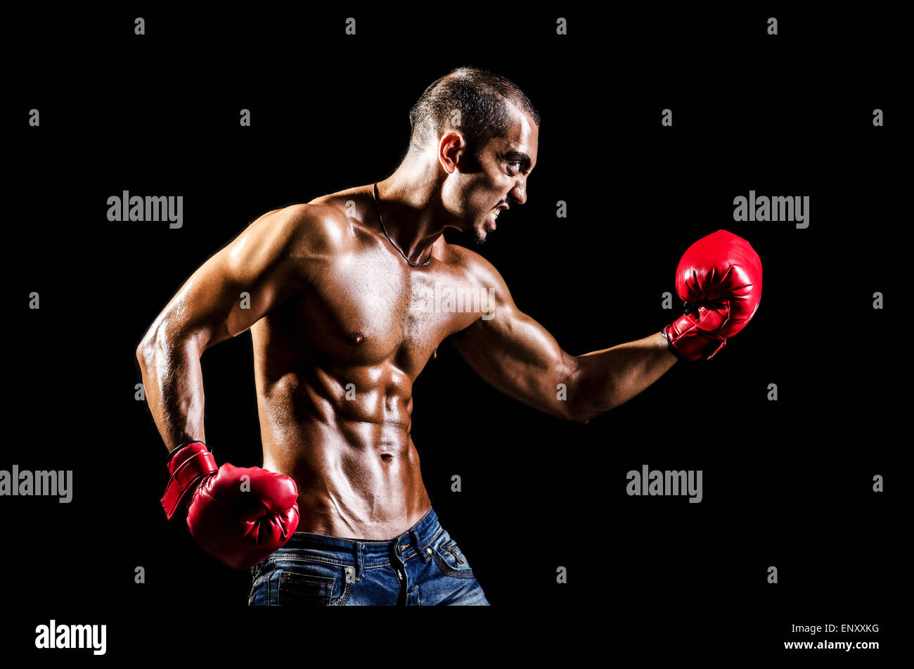 Young man with boxing gloves Stock Photo - Alamy