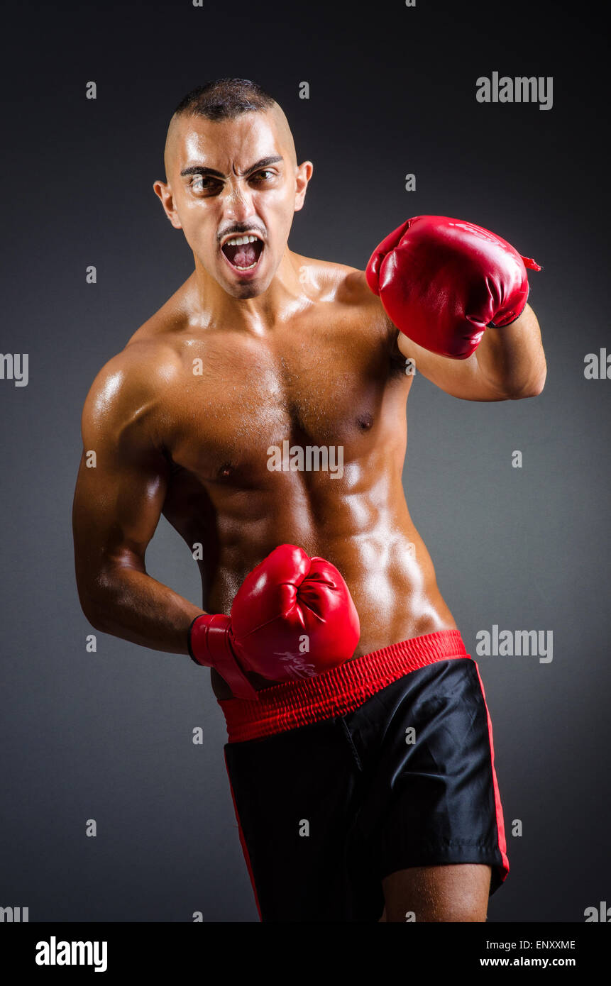 Muscular boxer in studio shooting Stock Photo - Alamy