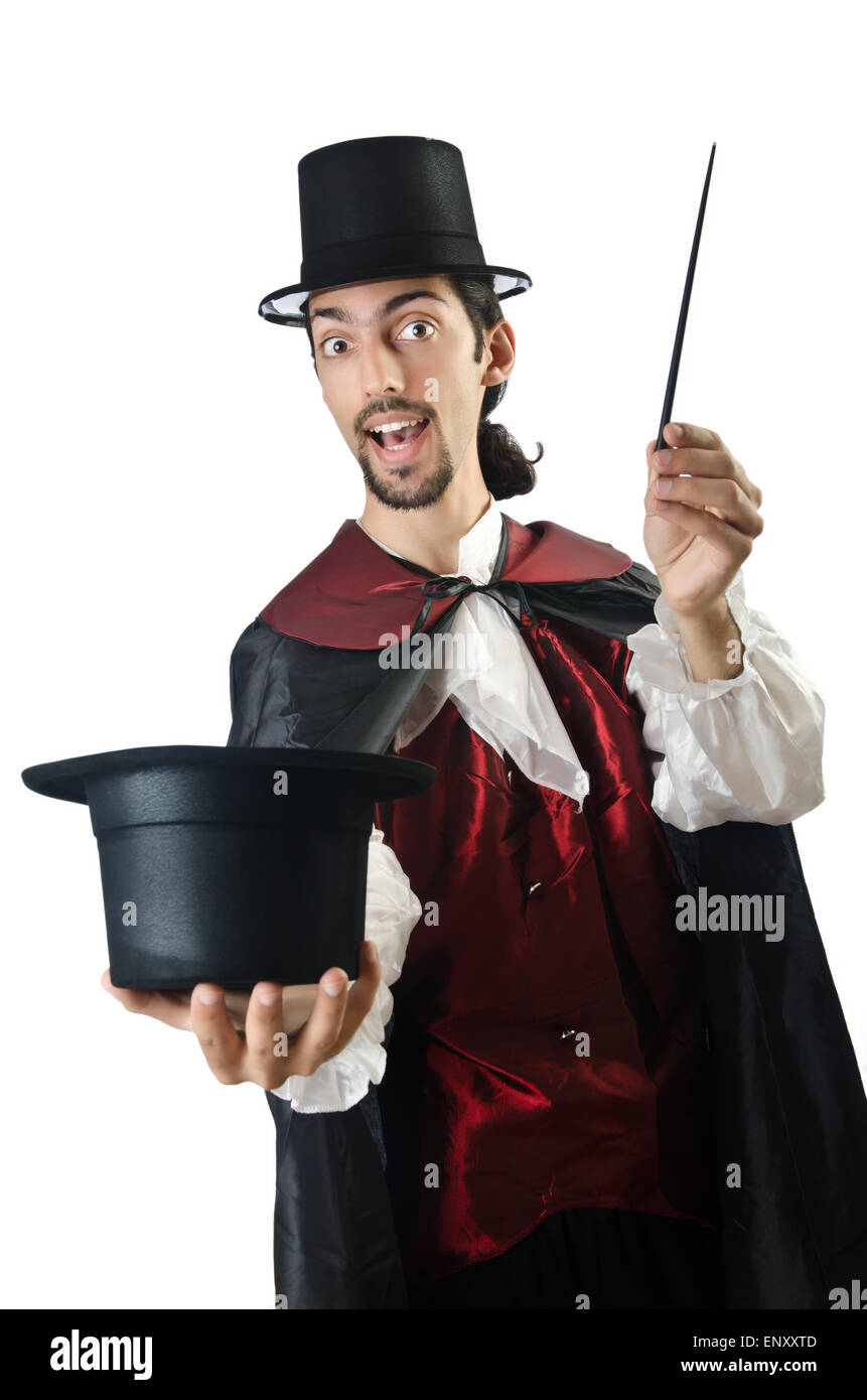 Magician doing tricks on white Stock Photo - Alamy