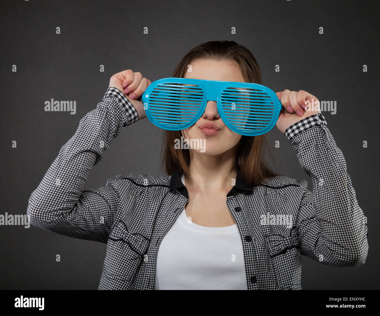 Portrait of the teen girl with crazy glasses Stock Photo - Alamy
