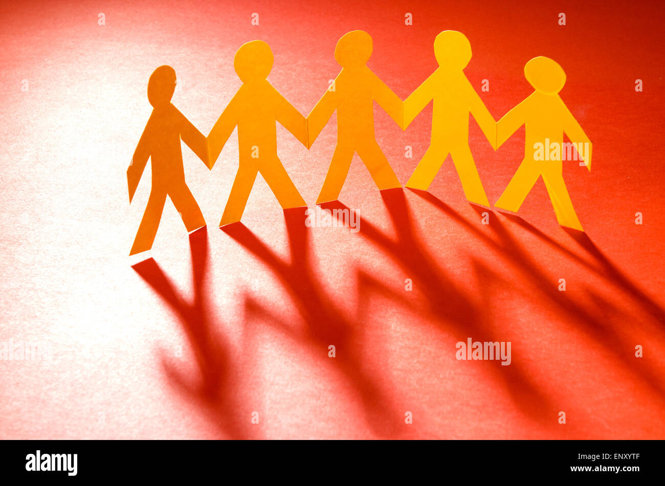 Paper people in teamworking concept Stock Photo - Alamy