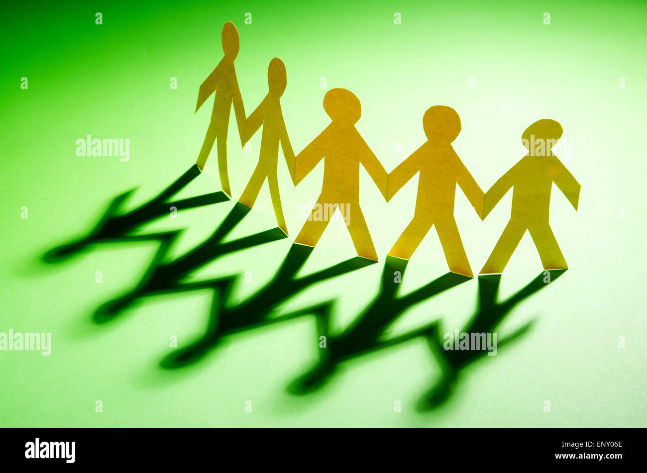 Paper people in teamworking concept Stock Photo - Alamy