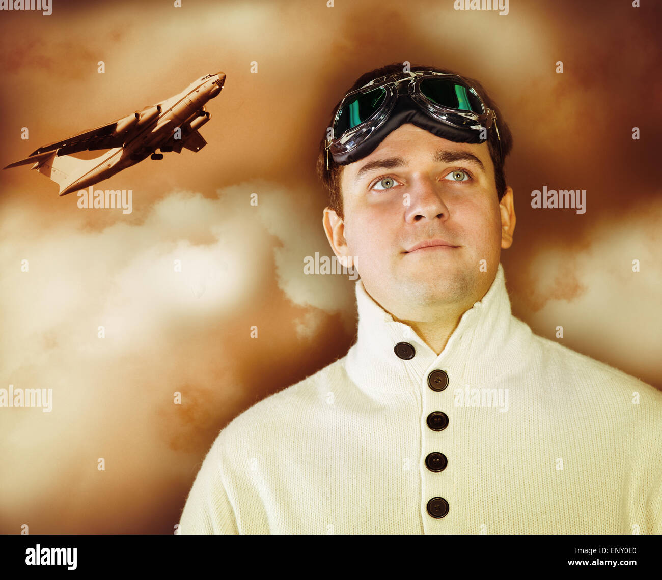 Young man in retro style clothes wearing old-fashioned pilot glasses ...