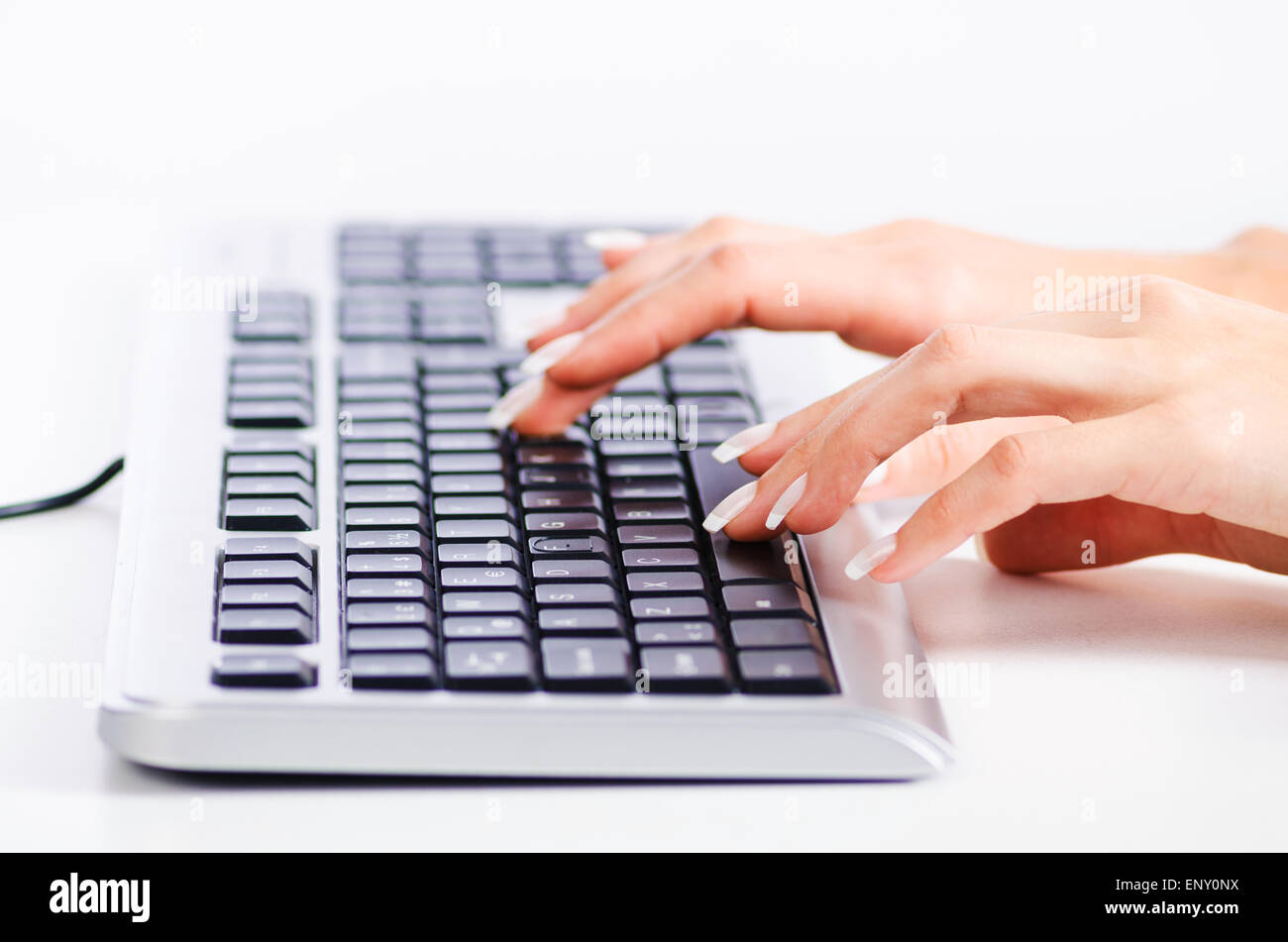 Hands working on the keyboard Stock Photo - Alamy