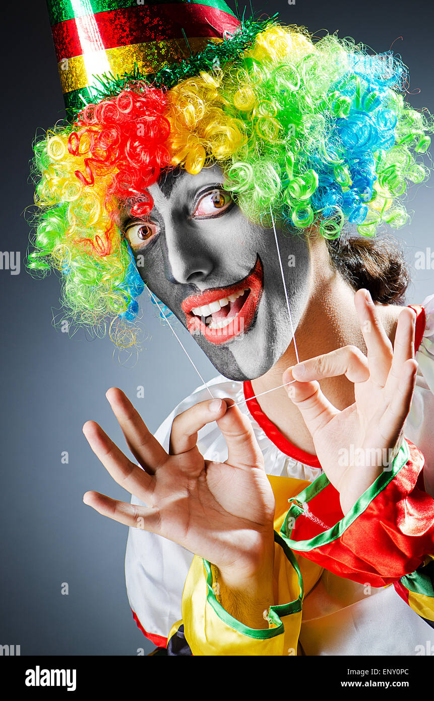 Funny clown in studio shooting Stock Photo - Alamy