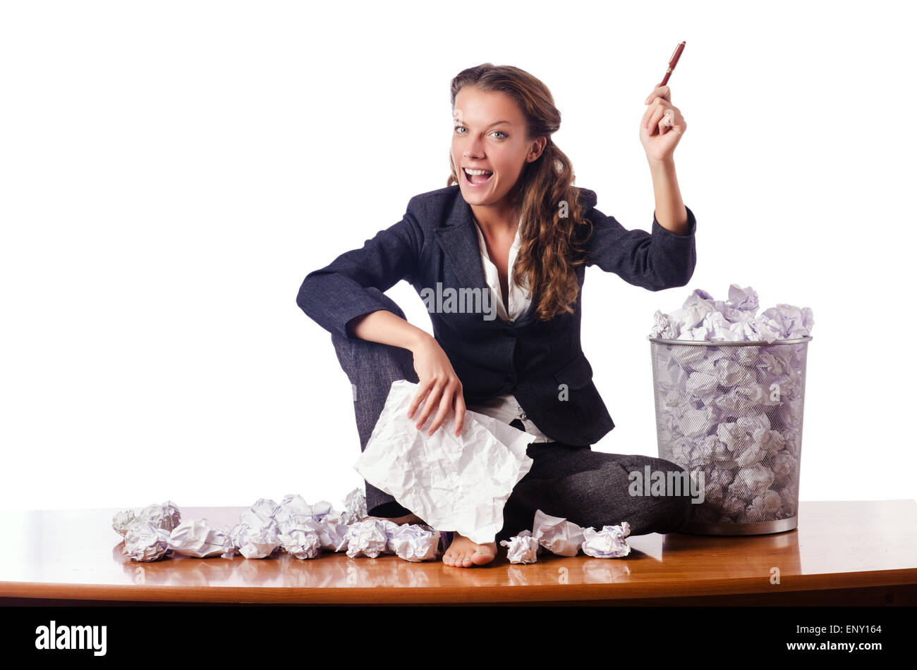 Woman with lots of discarded paper Stock Photo - Alamy