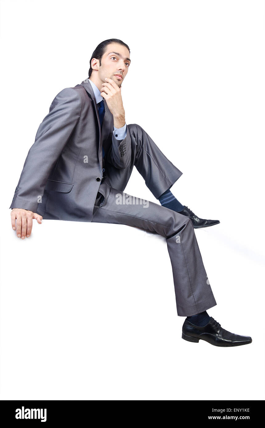 Man sitting on virtual chair Stock Photo - Alamy