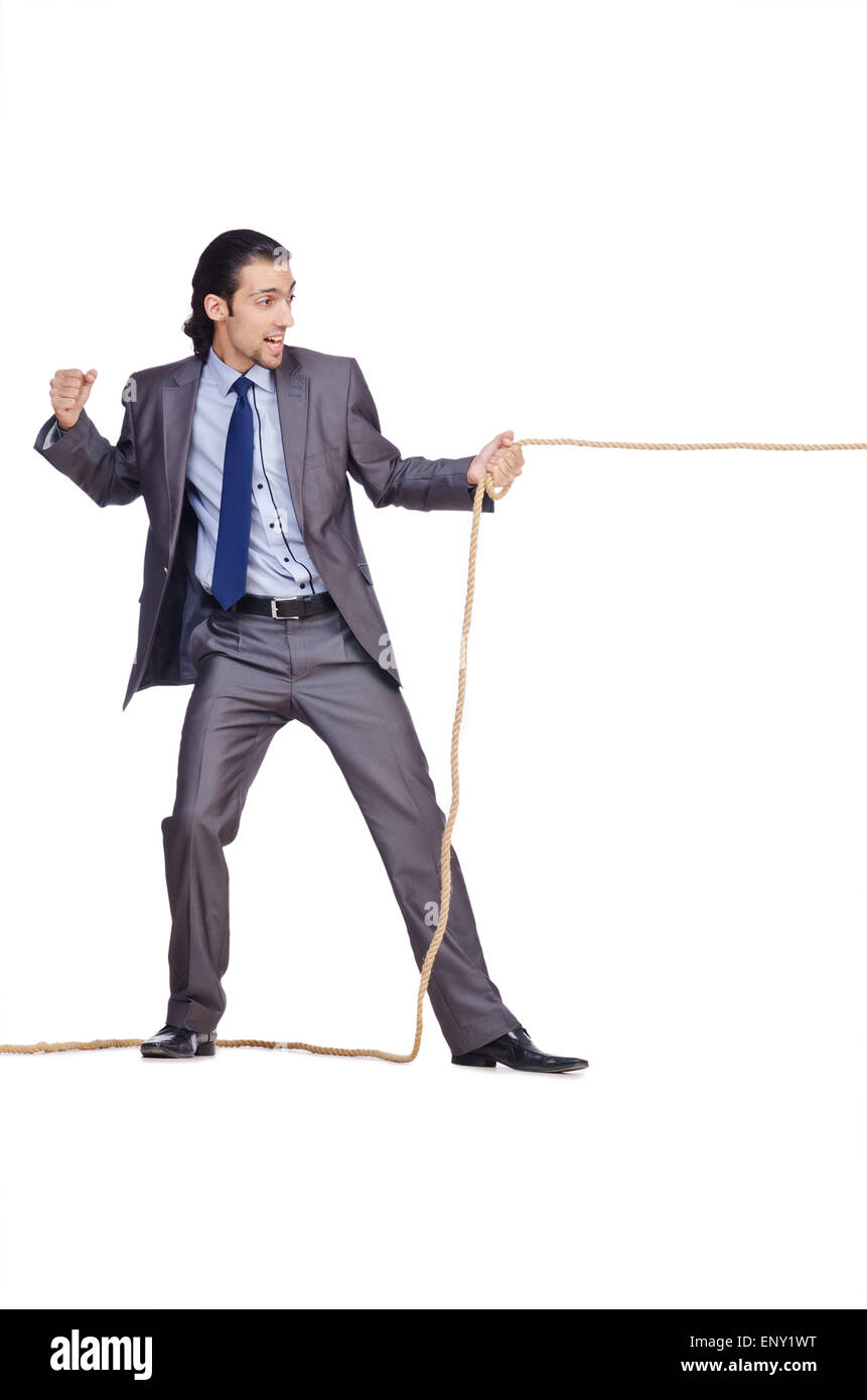 Businessman pulling rope on white Stock Photo - Alamy